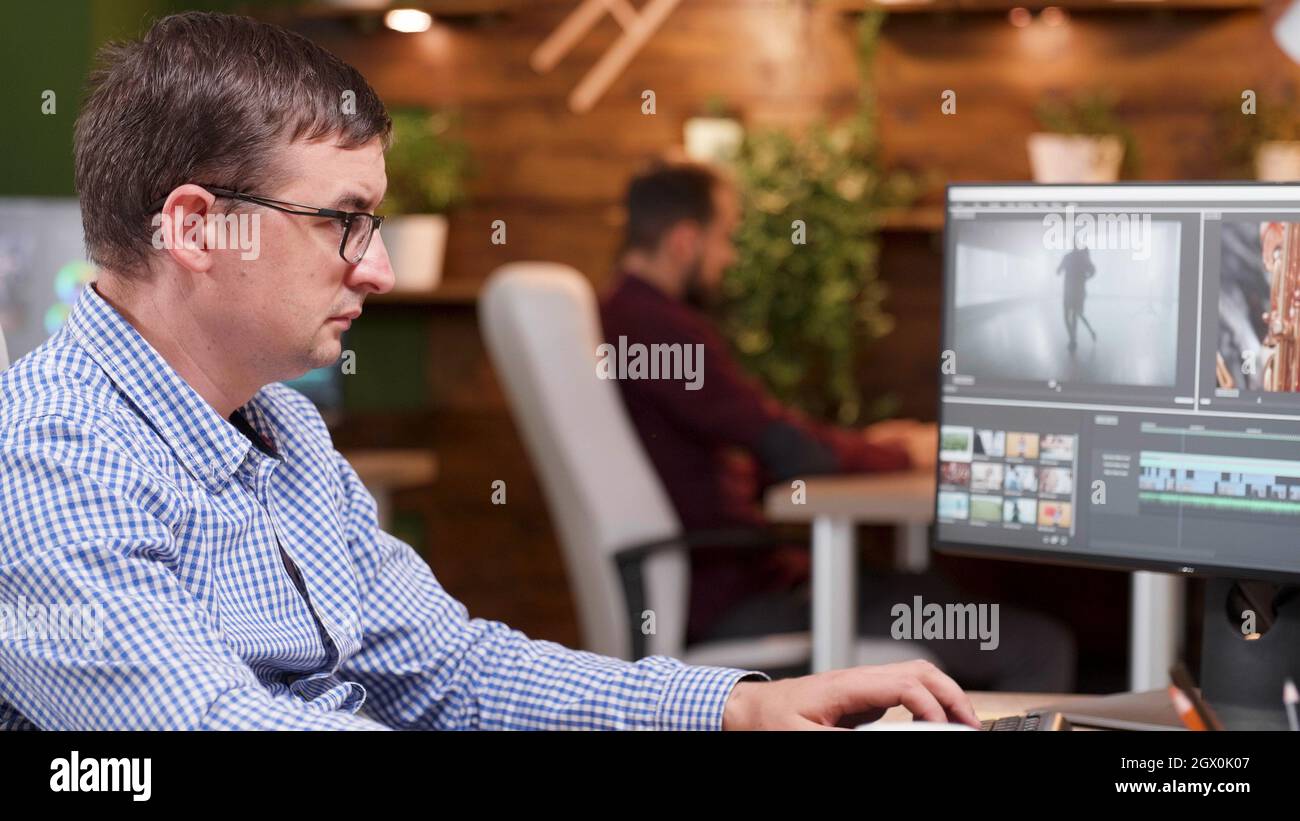 Videographer producer man editing hi-res stock photography and images ...