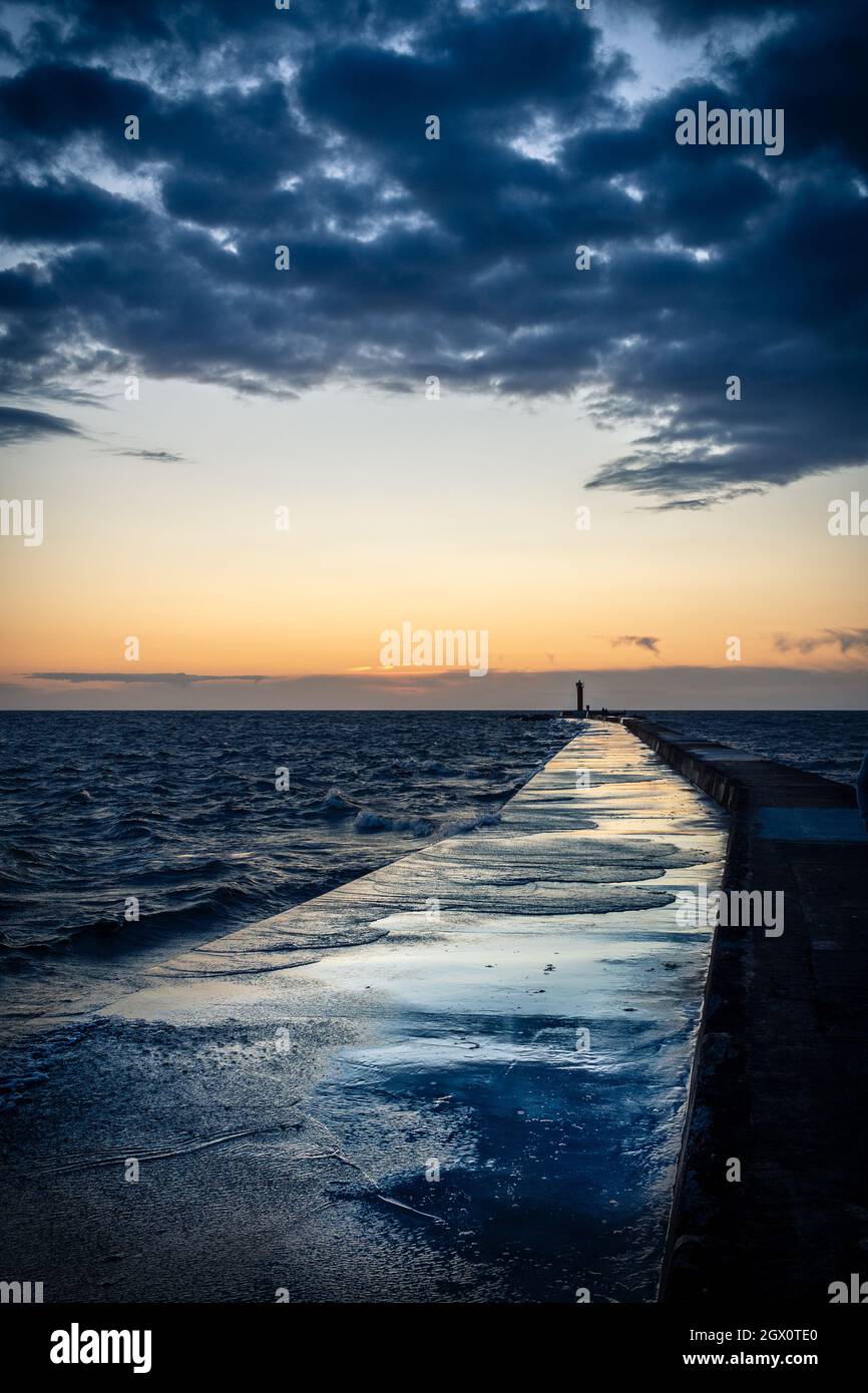 Seascape with groyne and dramatic sky hi-res stock photography and ...