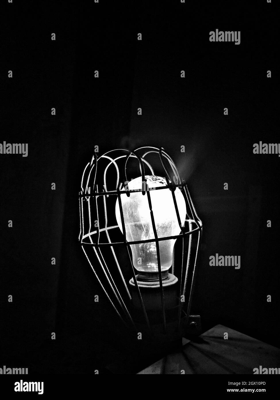 Hanging metal lamp post Black and White Stock Photos & Images - Alamy