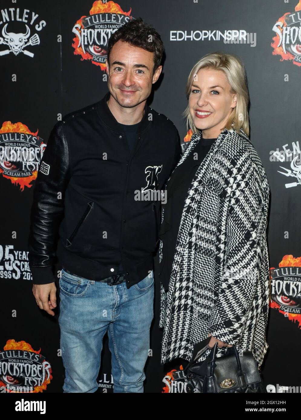 Crawley, UK. 01st Oct, 2021. Joseph McFadden (L) and guest attend the ...