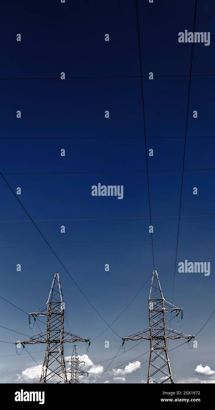 High voltage electrical lines and equipment against the blue sky Stock ...