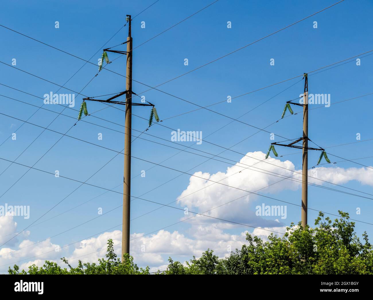 High voltage electrical lines and equipment against the blue sky Stock ...