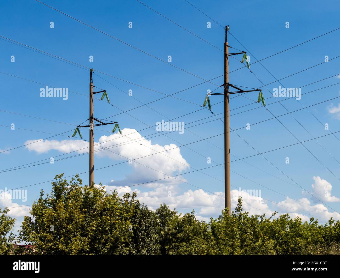 High voltage electrical lines and equipment against the blue sky Stock ...
