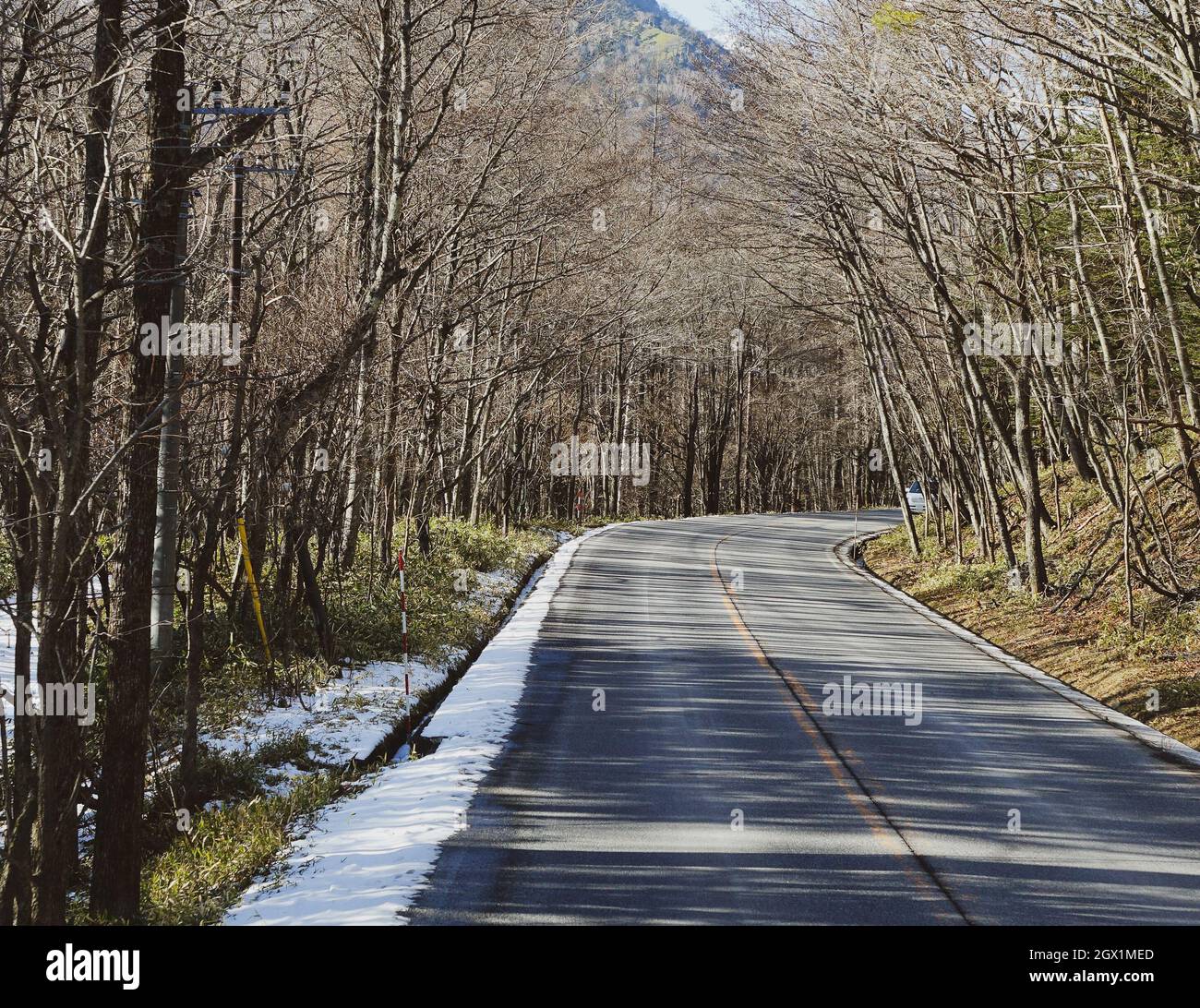 Mountain road at autumn in Nikko, Japan. Nikko offers beautiful scenery ...