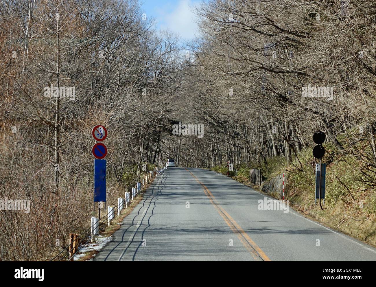 Mountain road at autumn in Nikko, Japan. Nikko offers beautiful scenery ...