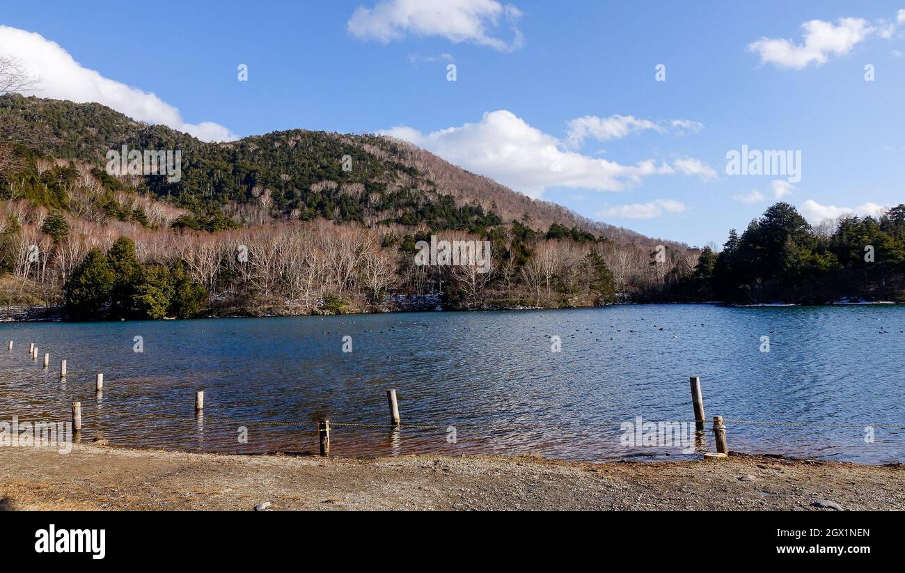 Lake scenery at winter in Nikko, Japan. Nikko is famous for its ...