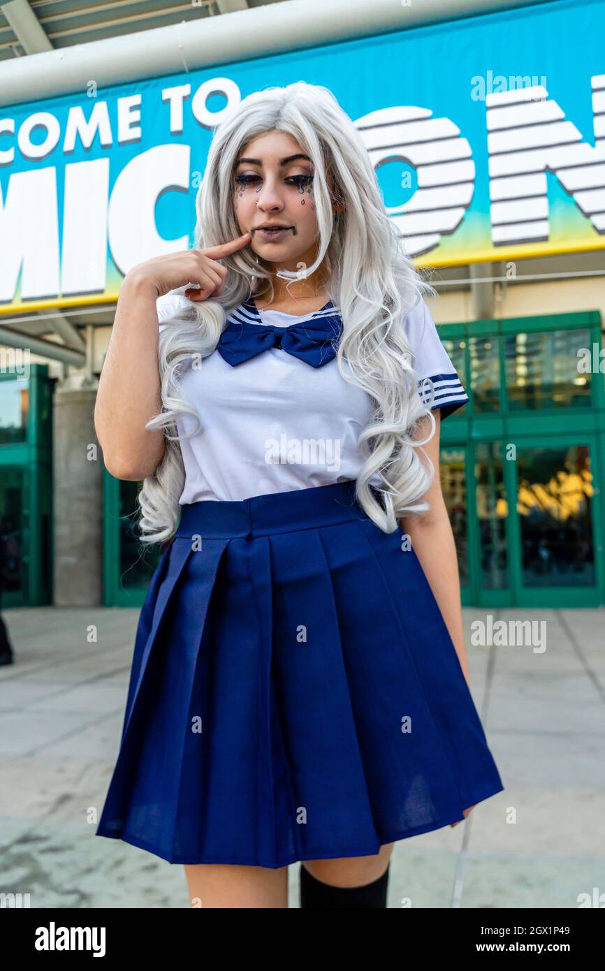 Attendee portraying schoolgirl in uniform, at Comic Con in Los Angeles ...