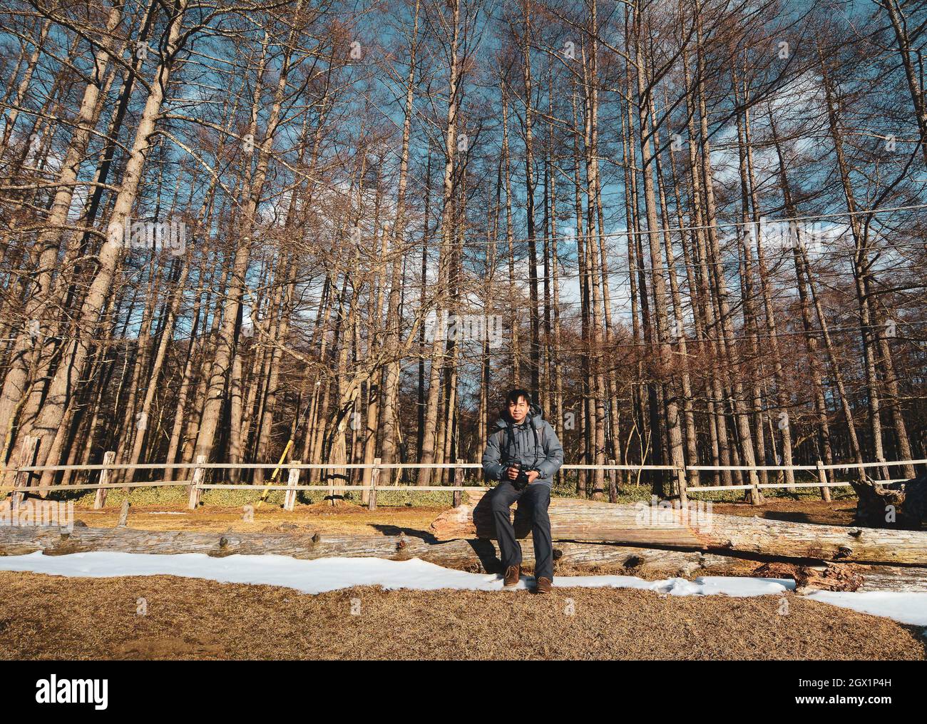 Traveler at winter forest of Nikko, Japan. Nikko is famous for its ...