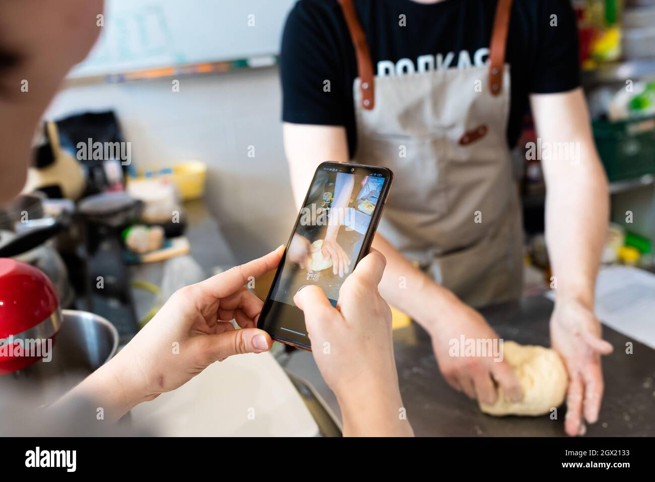 A baker forms bread and takes pictures of it Stock Photo - Alamy
