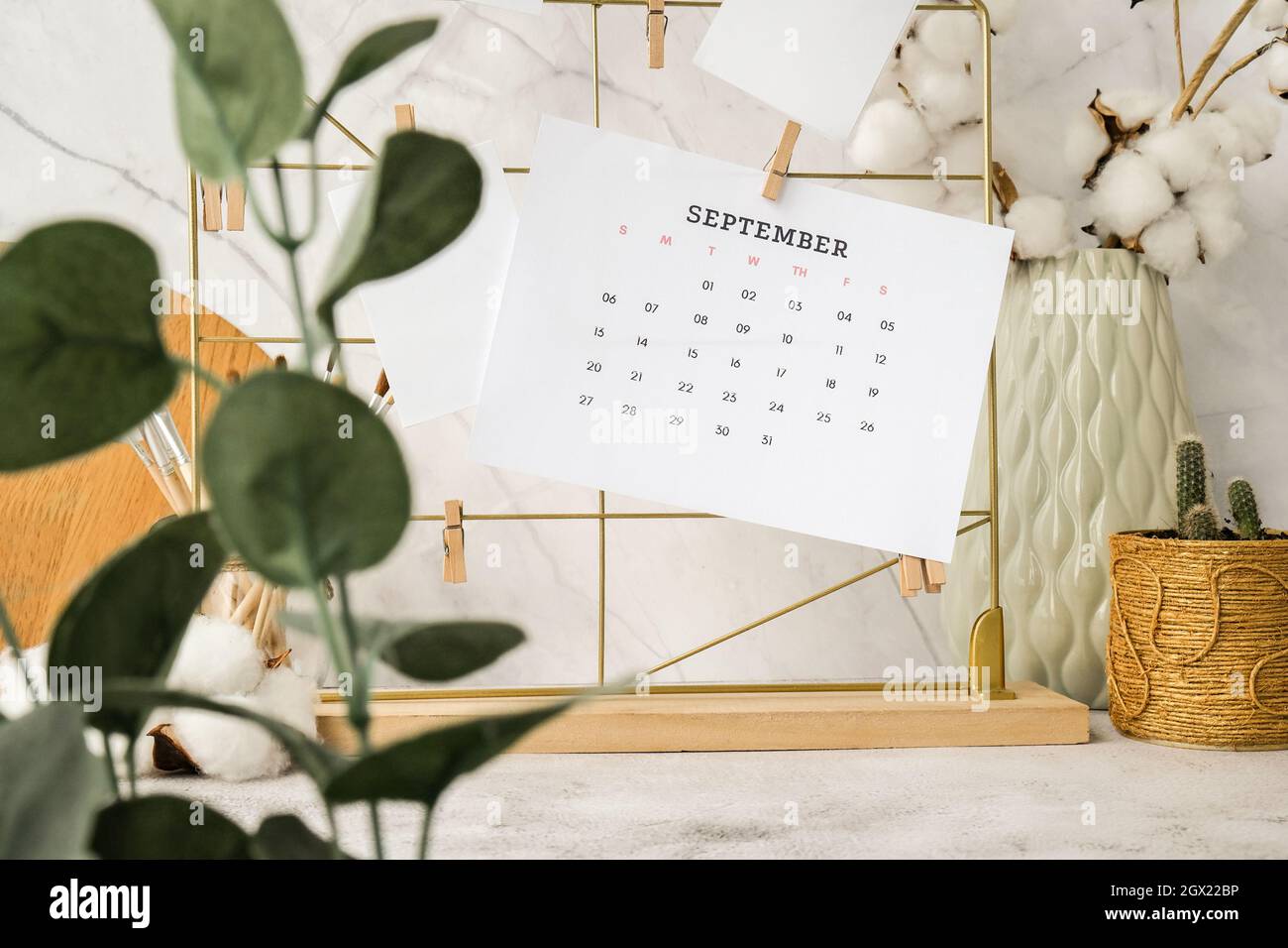 SEPTEMBER CALENDAR Cards and posters mock ups on grid board. Copy space ...