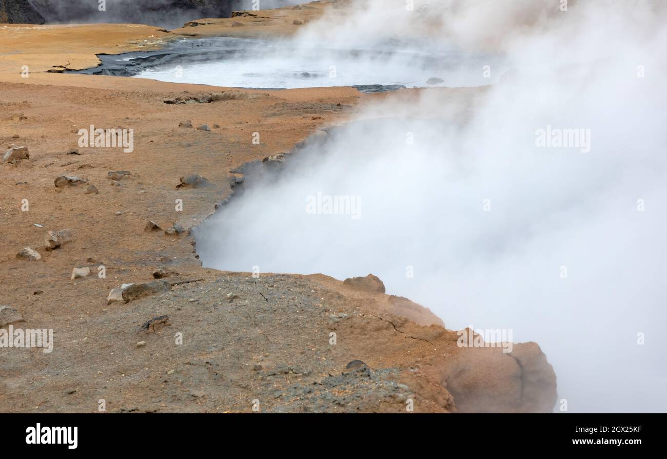 Steaming fumarole in geothermal area of Hverir, Namafjall in northern ...
