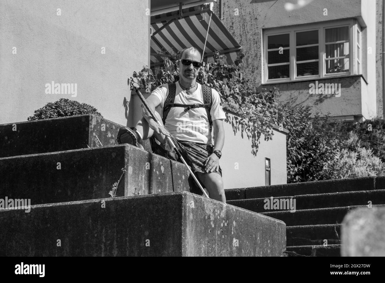 Portrait Of Man Standing By Building Stock Photo - Alamy