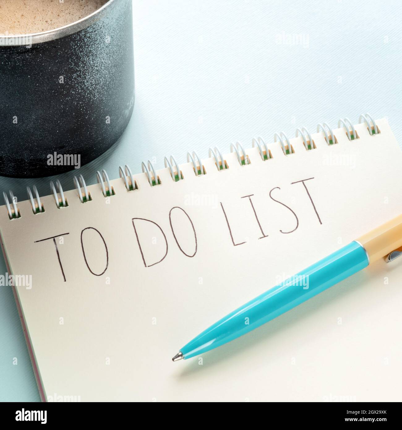 To do list, square shpt. A paper notepad with coffee and a turquoise ...