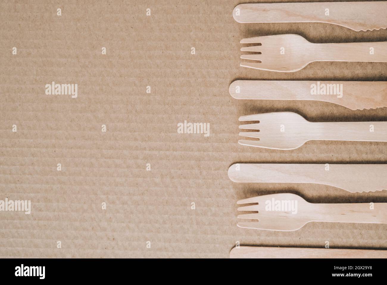 Eco friendly fast food containers. Wooden forks and knives. Eco ...