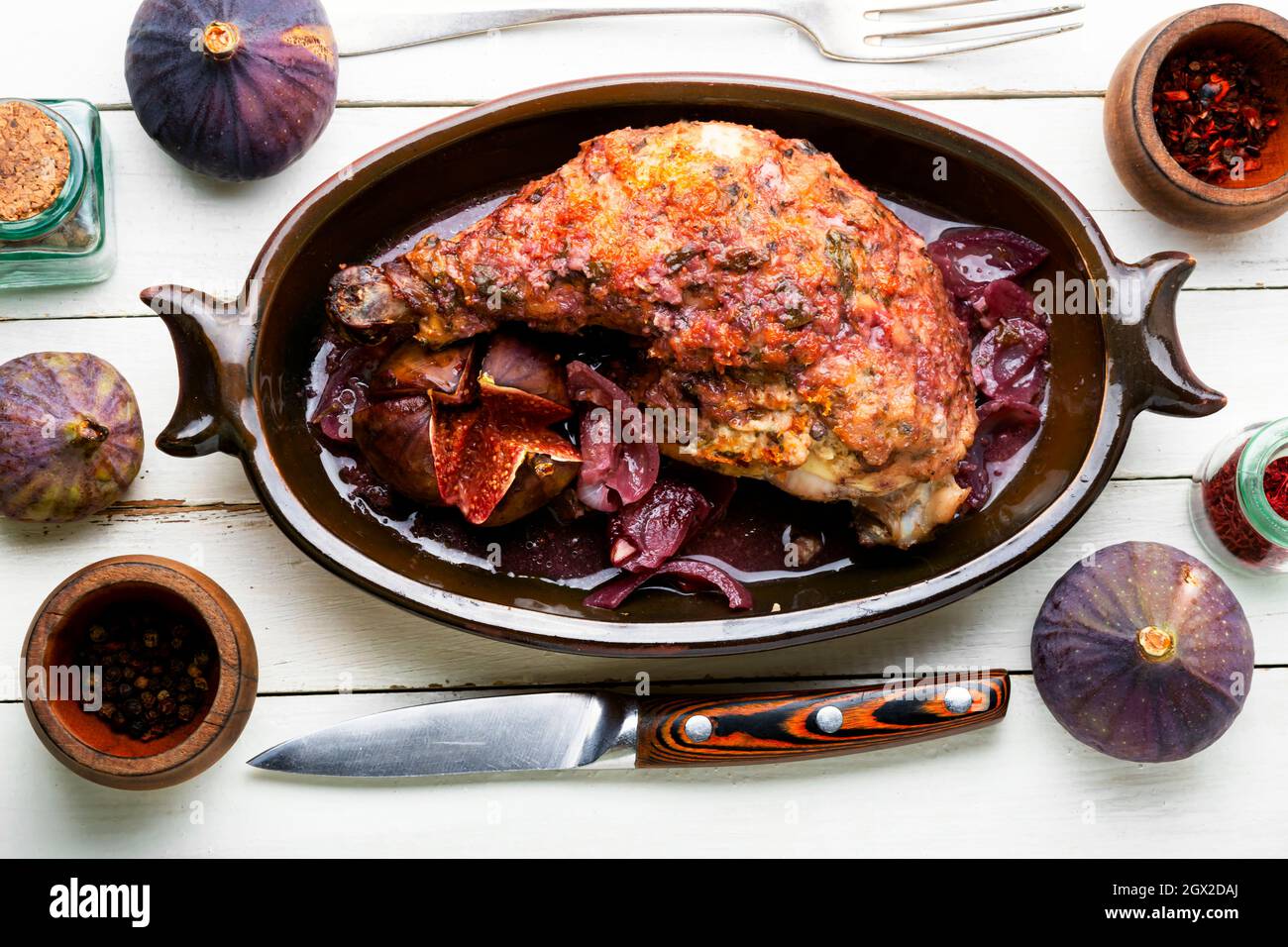 Chicken meat fried in fig fruit. Meat poultry with figs sauce Stock ...