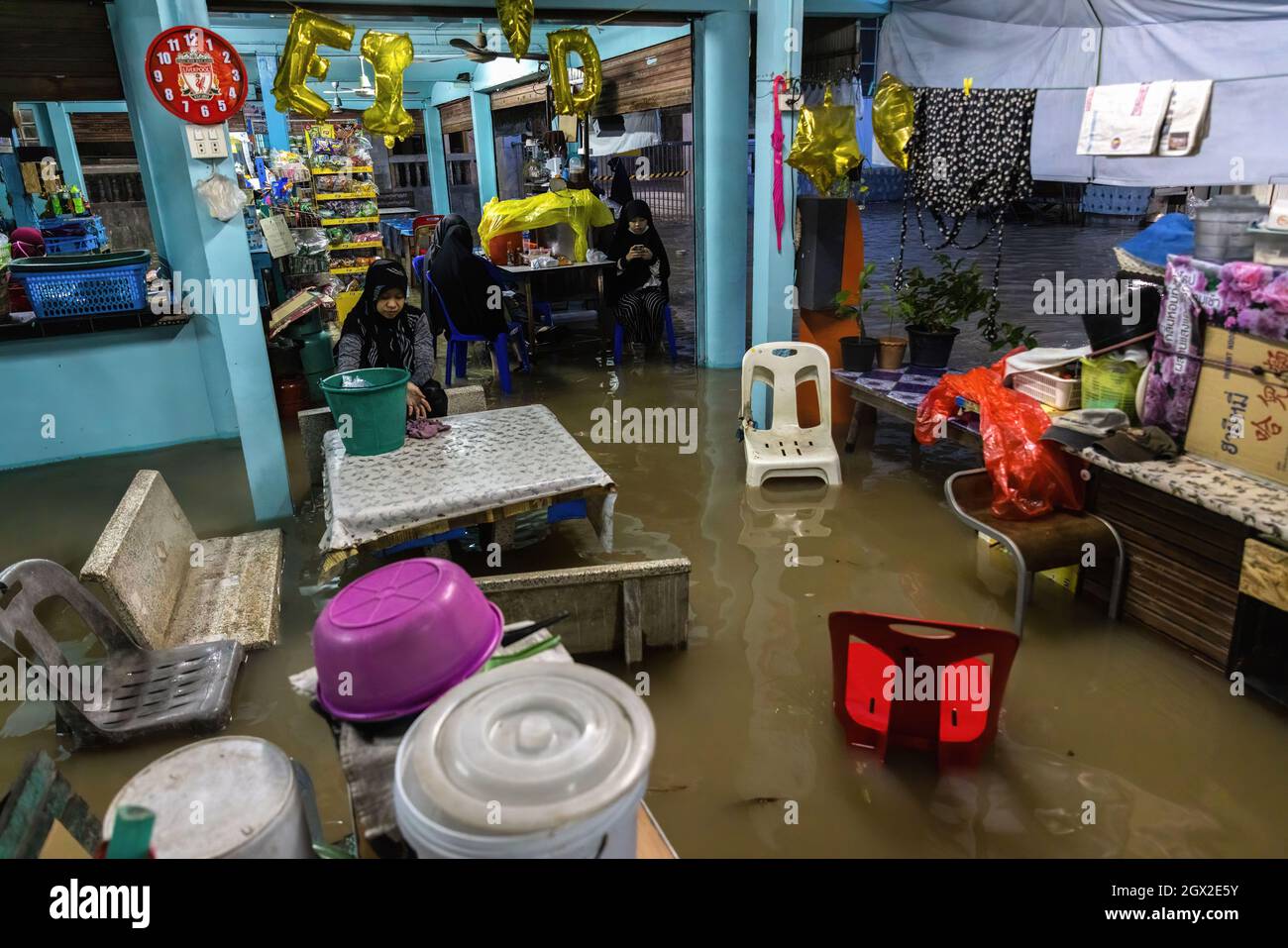 A view of a flooded store after a strong storm. Thailand has faced ...