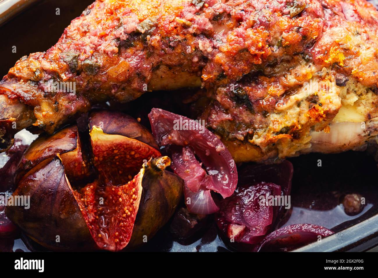 Chicken meat fried in fig fruit. Dinner meat with figs sauce.Close up ...