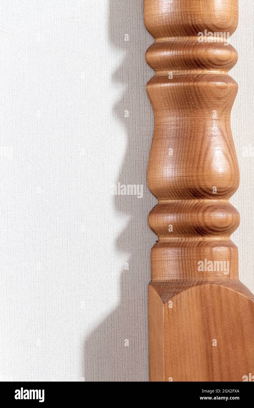Element of a wooden interior staircase. Wooden baluster close-up Stock ...