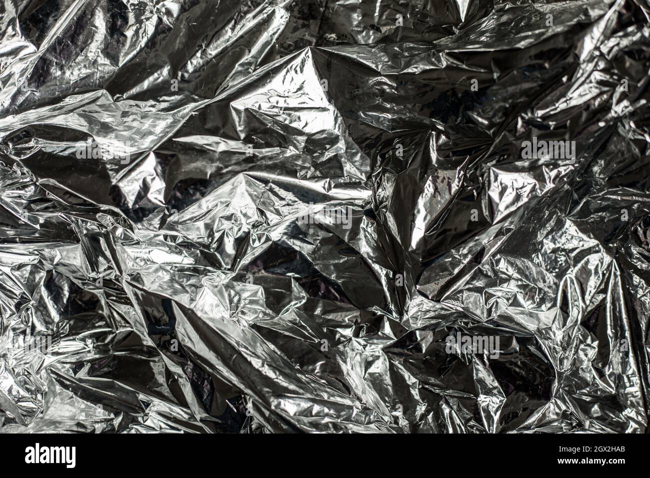 Close up of aluminium foil crumpled. Silver foil texture background ...