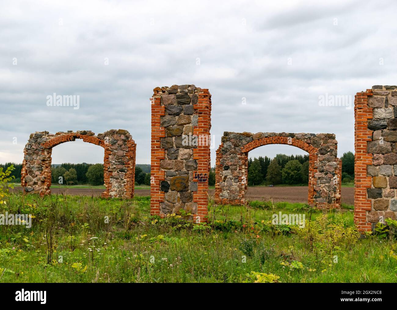 landscape with stone and brick barn ruins reminiscent of one of the ...