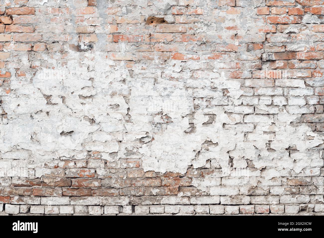 Texture of damaged old brick wall with weather worn surface as ...