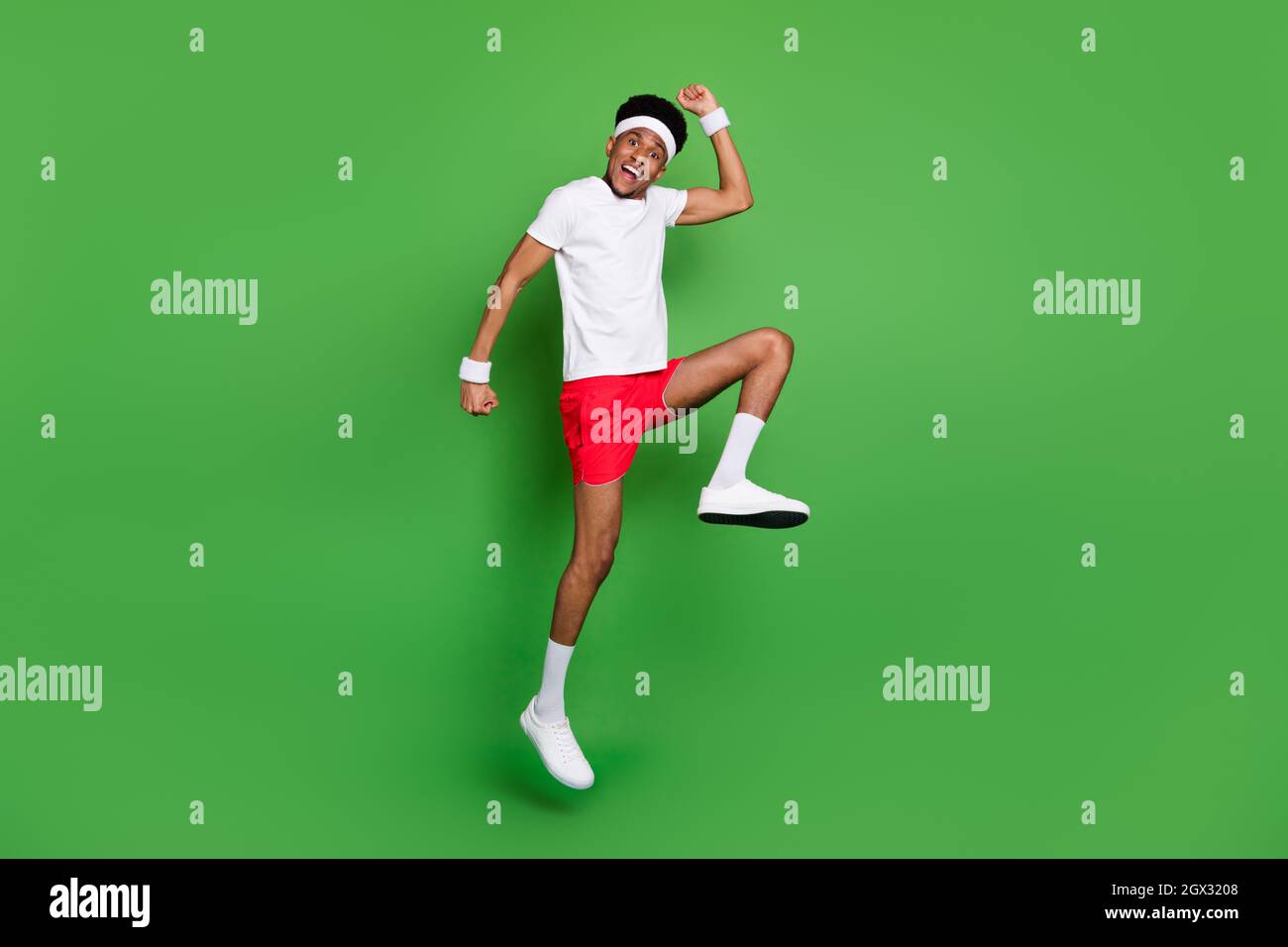 Full length body size view of attractive cheerful guy sportsman jumping ...