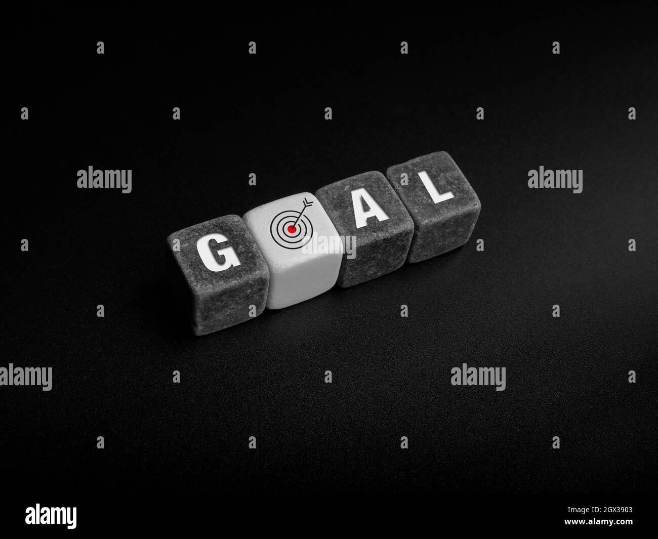 Goals concept. Goal, word and target icon sign on black and white cube ...