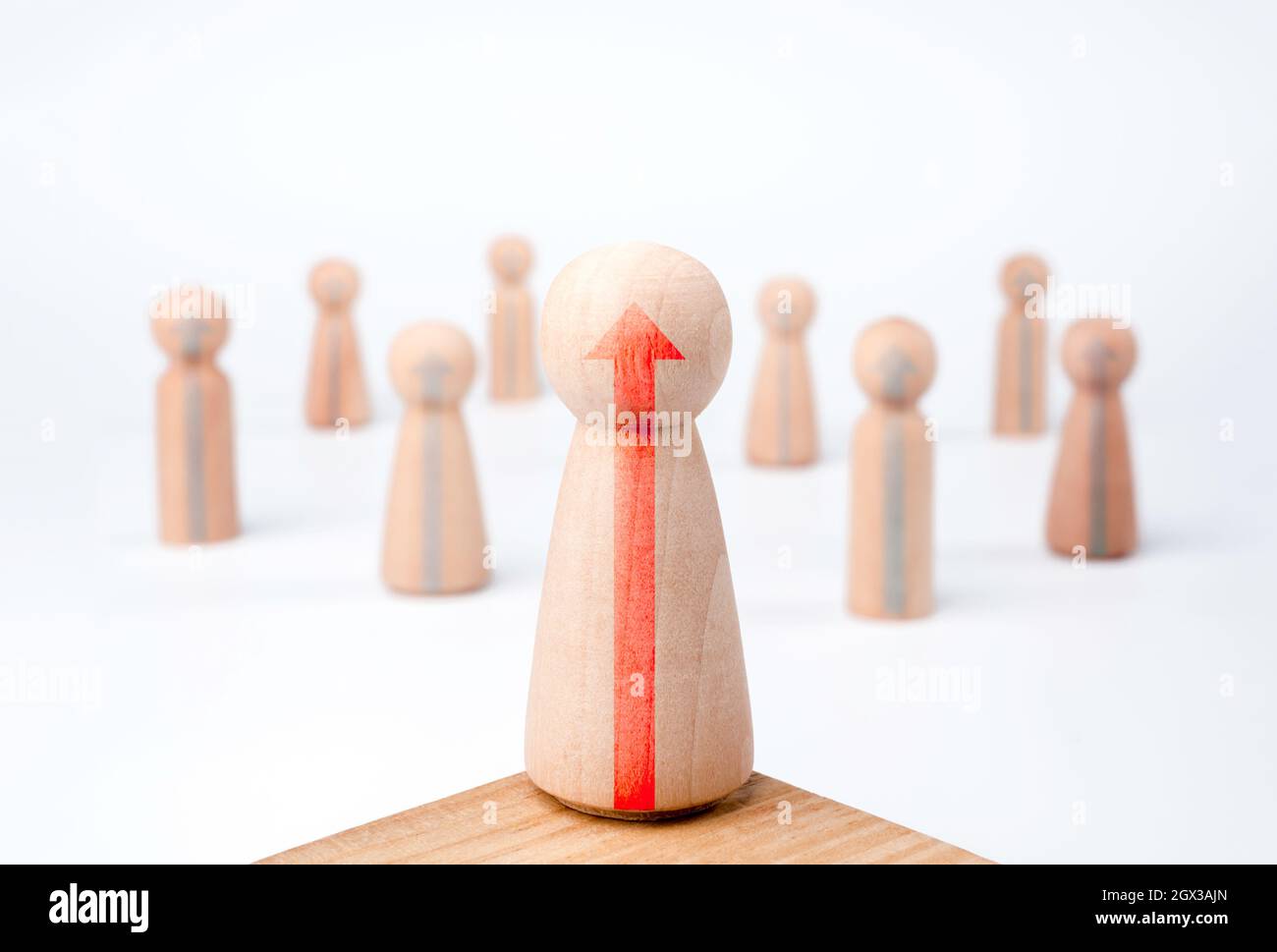 Leader woman, influencer, wooden figures with growth arrows, female ...