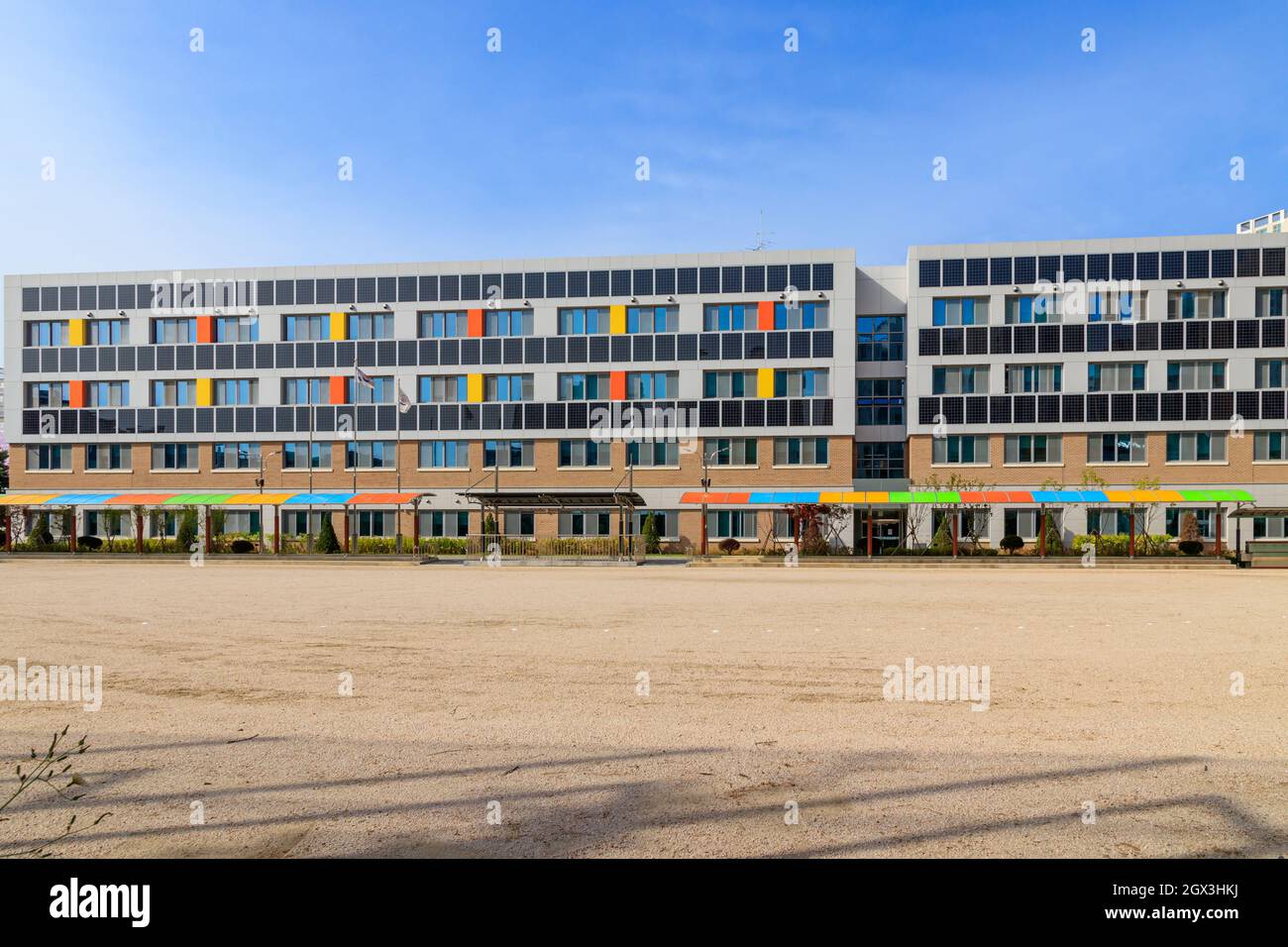 Building solar panels. Solar elementary school building. Eco-friendly ...