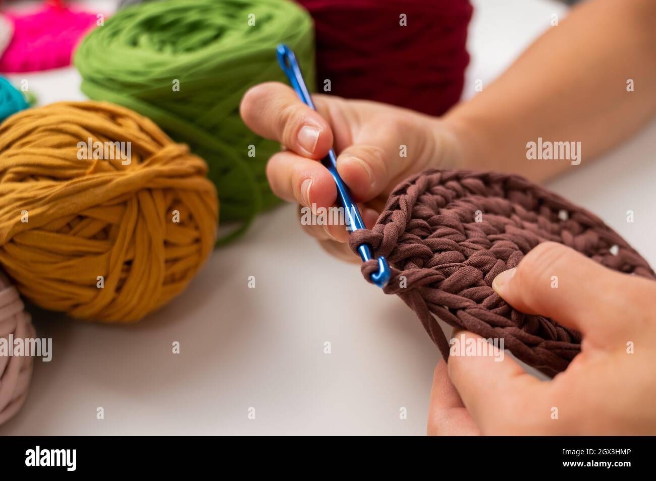 Woman crocheting hi-res stock photography and images - Alamy