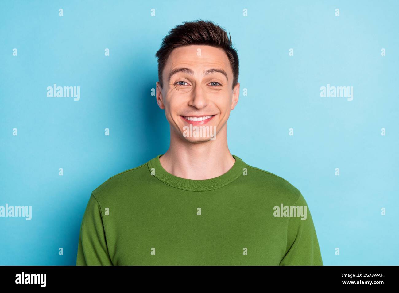 Photo of cheerful positive handsome man toothy beaming smile wear green ... Photo of cheerful positive handsome man toothy beaming smile wear green ...