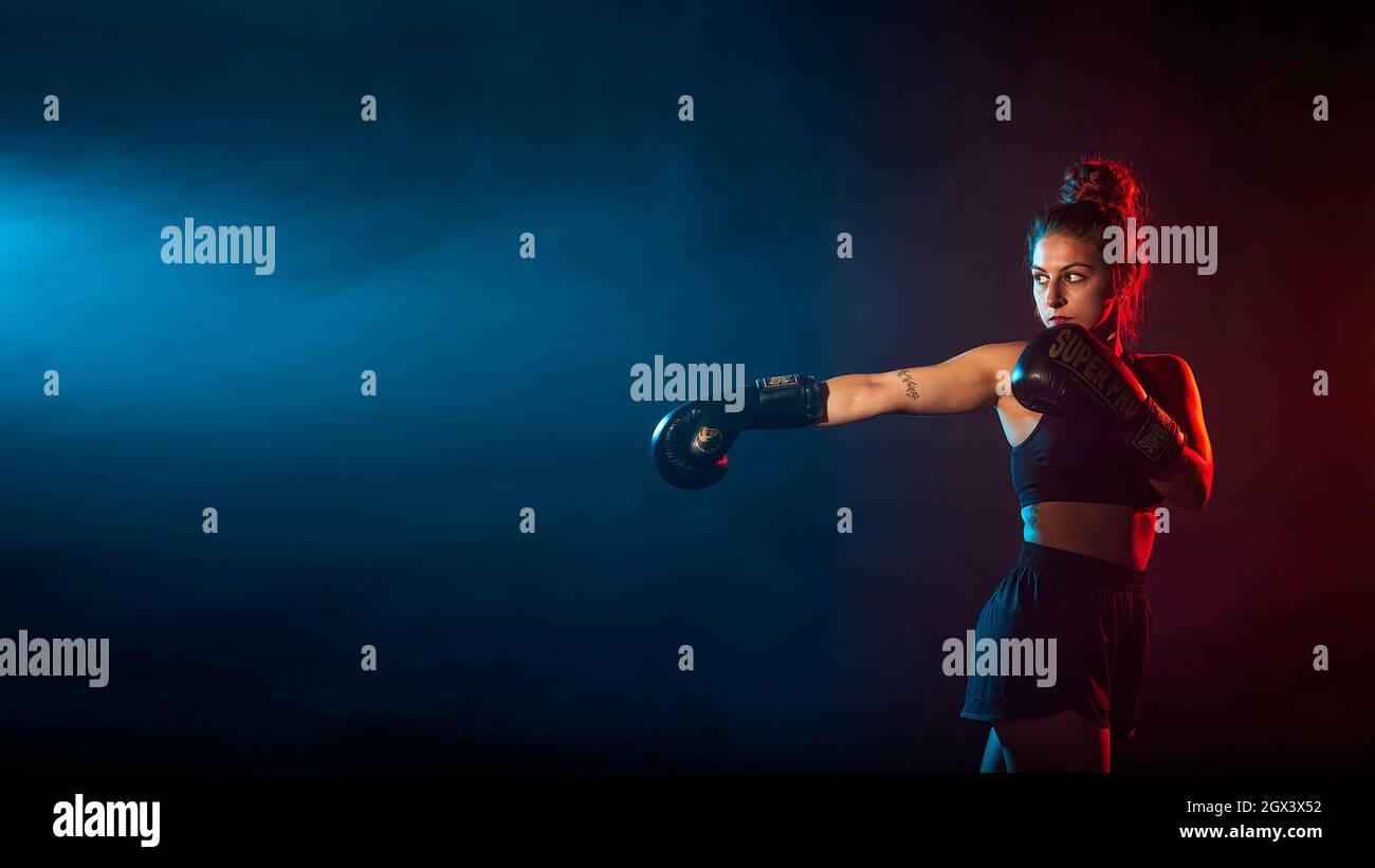 Boxing. Young woman athletic female MMA fighter training. Concept of ...