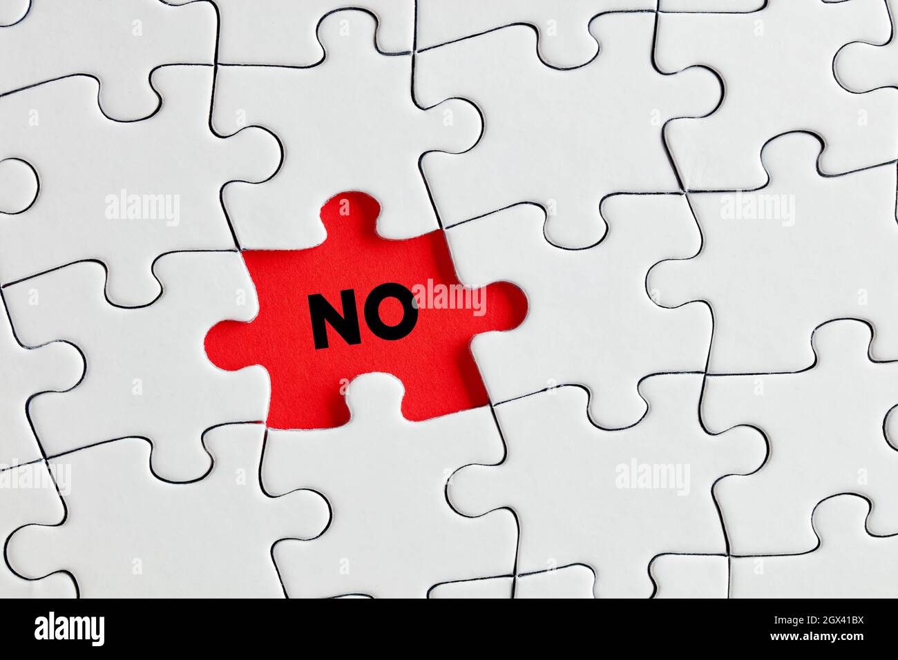 The word no written on red missing puzzle piece Stock Photo - Alamy