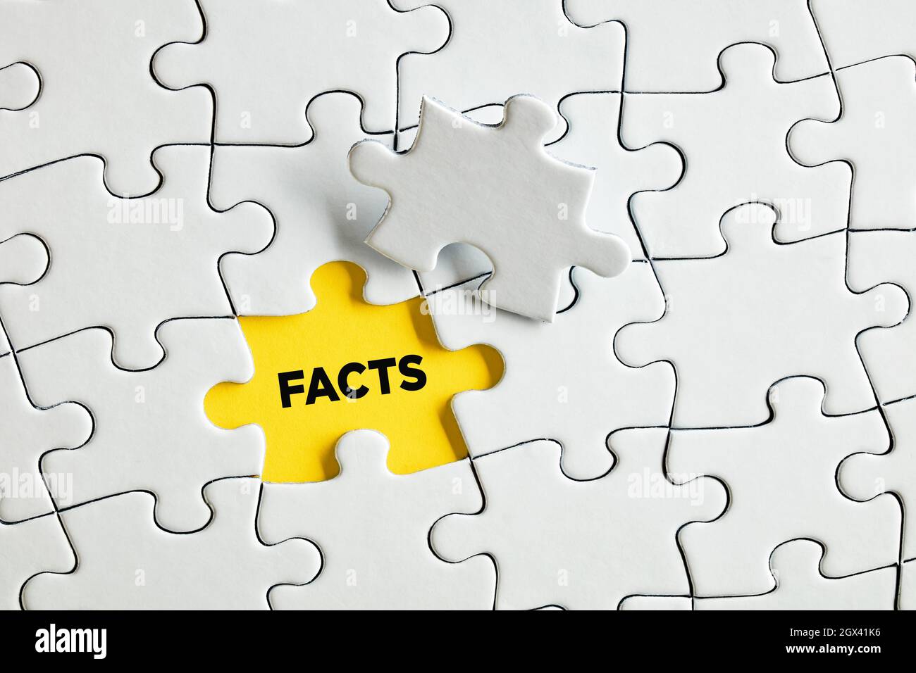The word facts on yellow missing puzzle piece. To reveal, discover or ...
