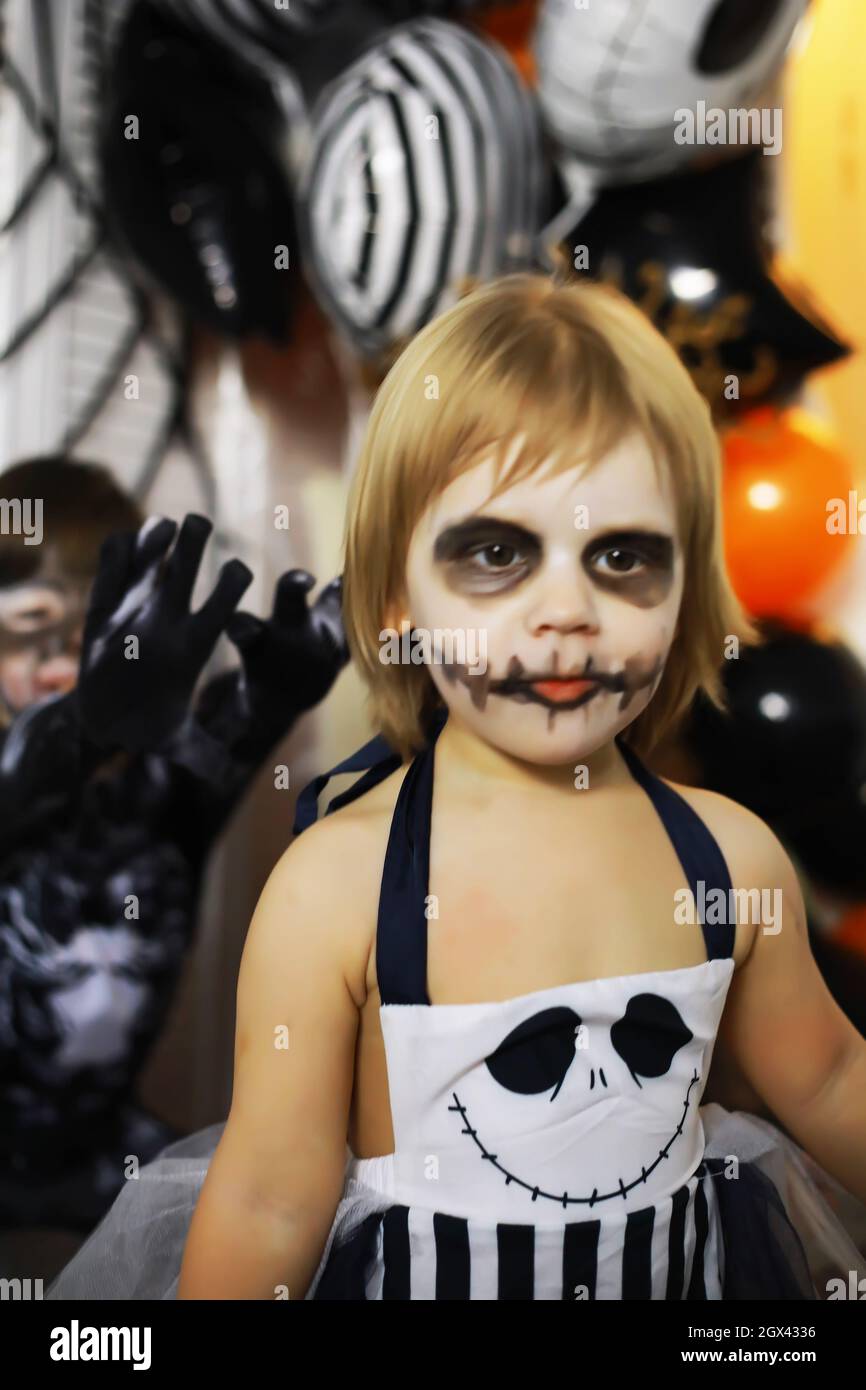 happy family with childrens in costumes and makeup on celebration of ...