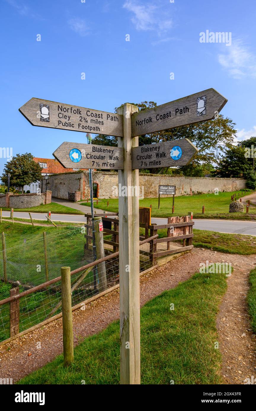 Signpost for walkers at a footpaths in Blakeney, Norfolk, England ...