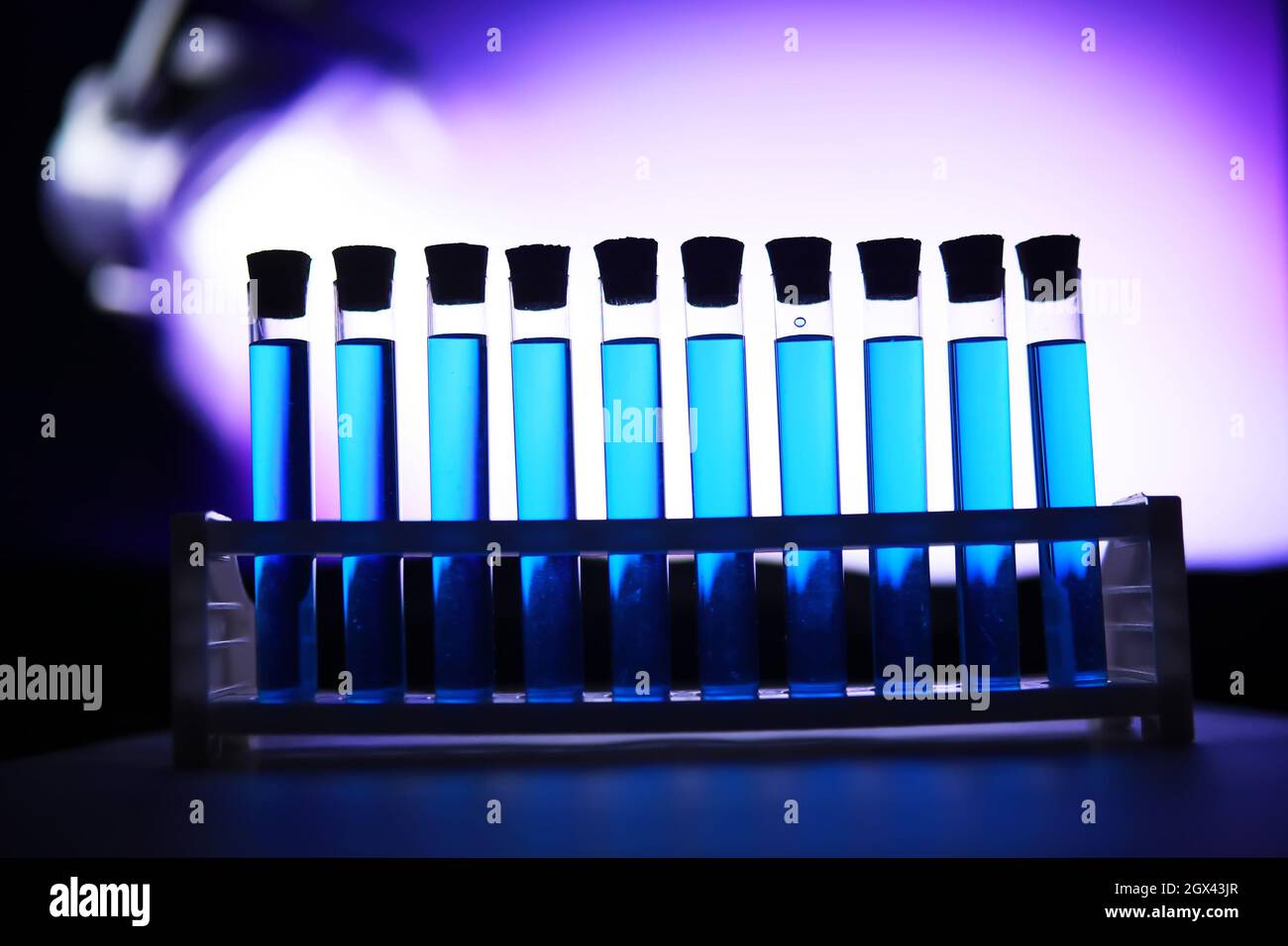 Test tube of glass overflows new liquid solution potassium blue ...