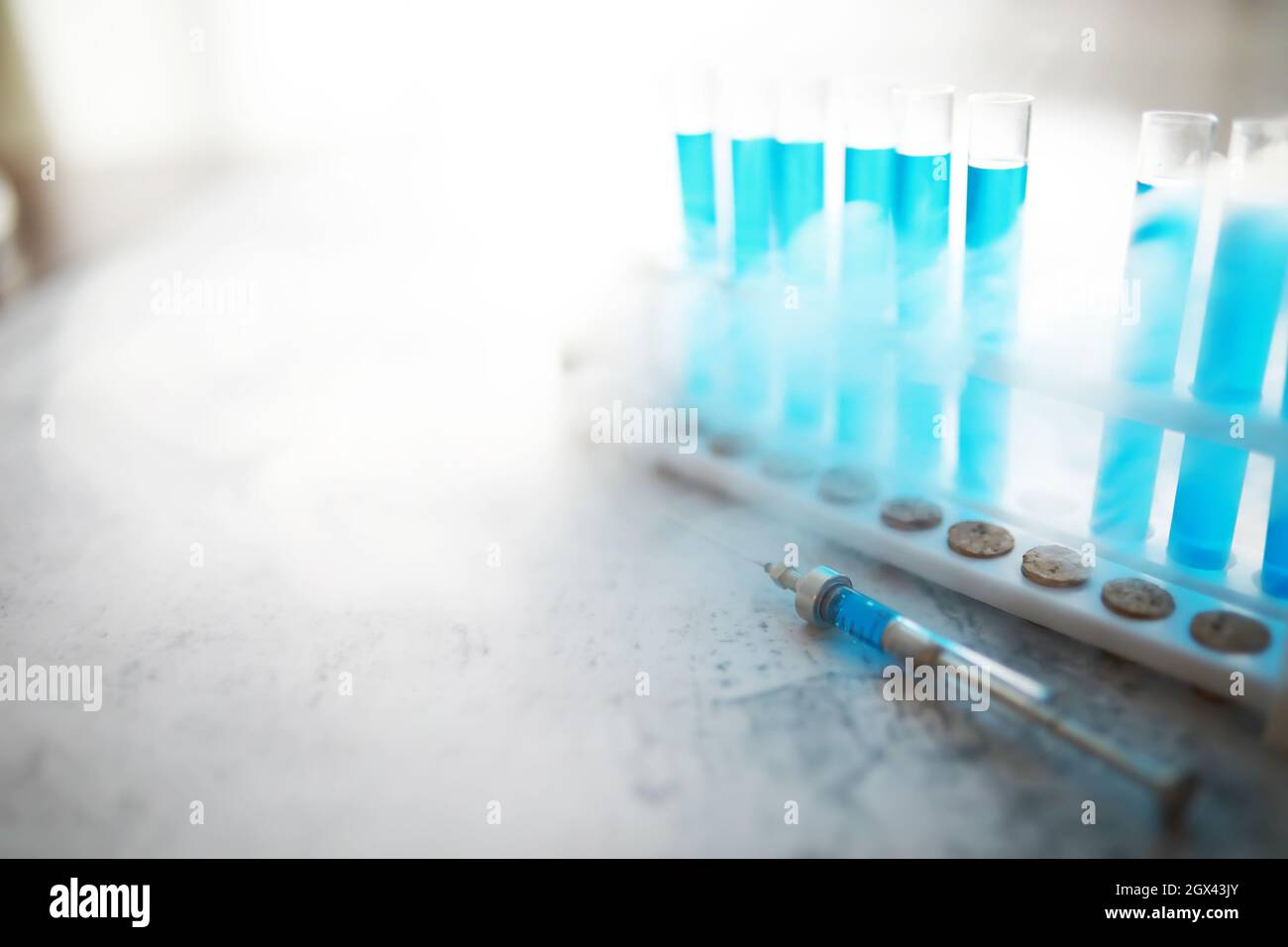 Test tube of glass overflows new liquid solution potassium blue ...