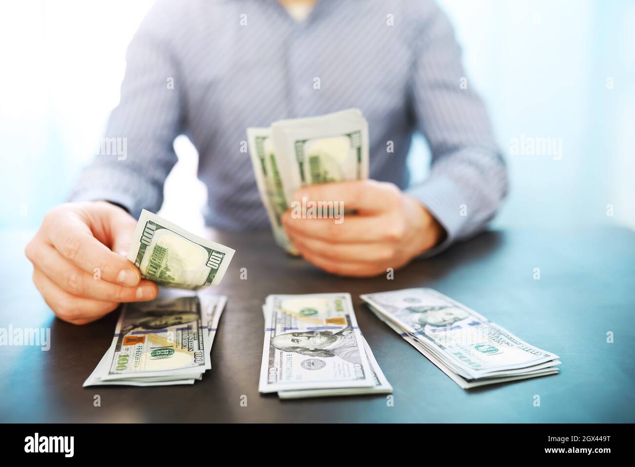 Cash money in a large pile as a finance background. Paper money close ...