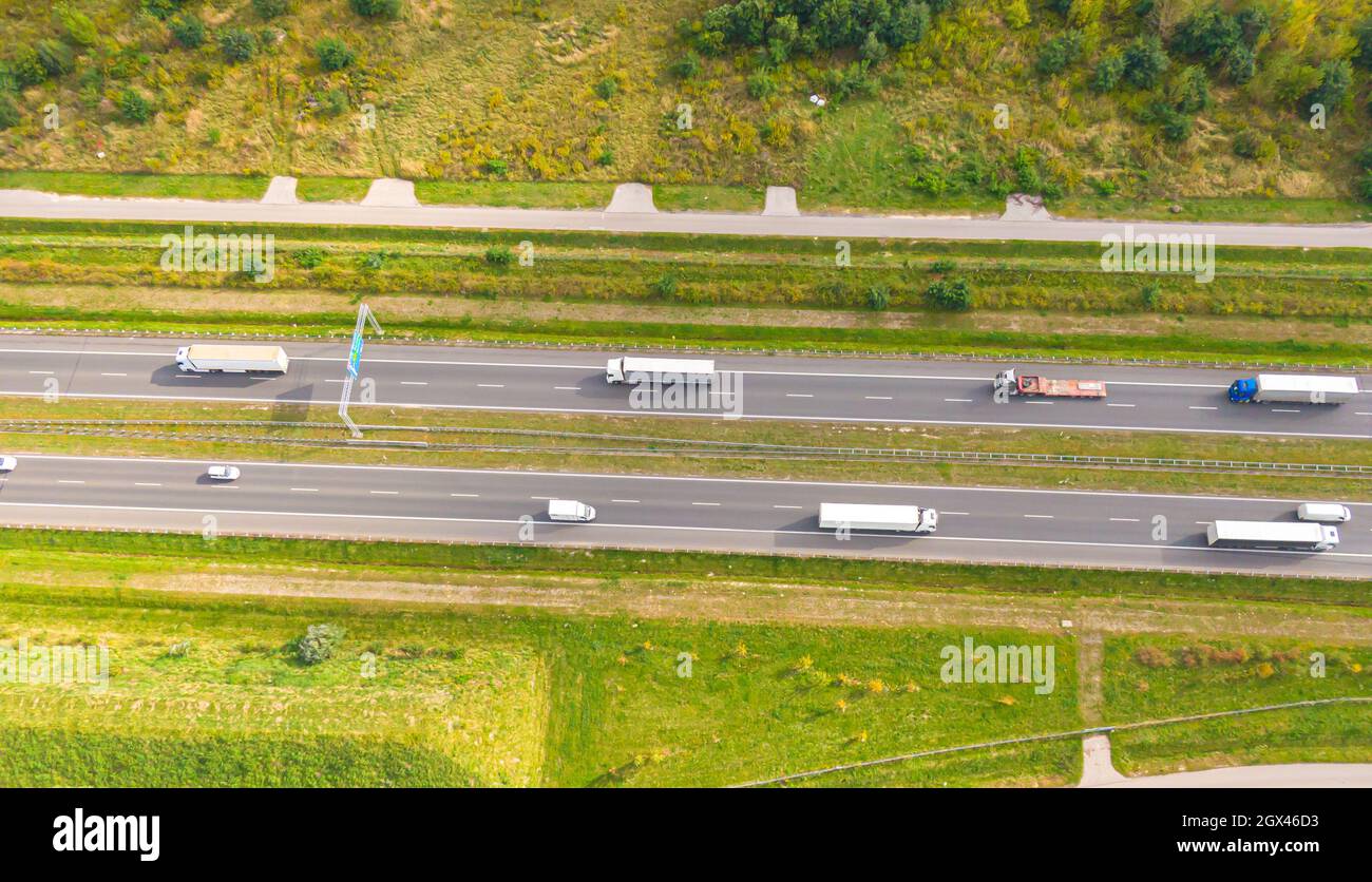 Aerial Top View of White Truck with Cargo Semi Trailer Moving on Road ...