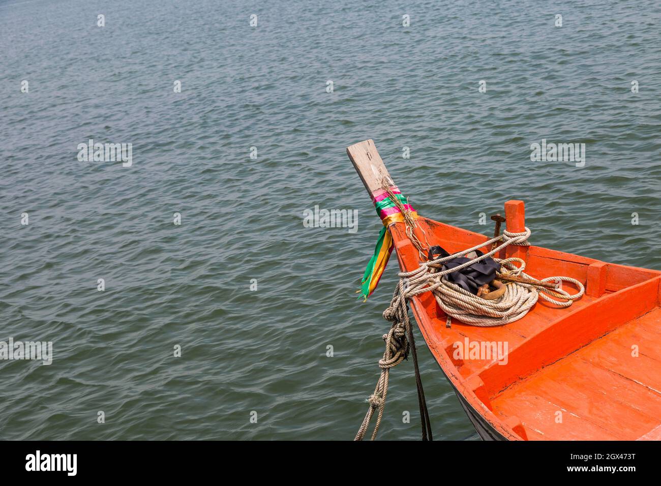 Orange wood fishing boat at Thailand Stock Photo - Alamy