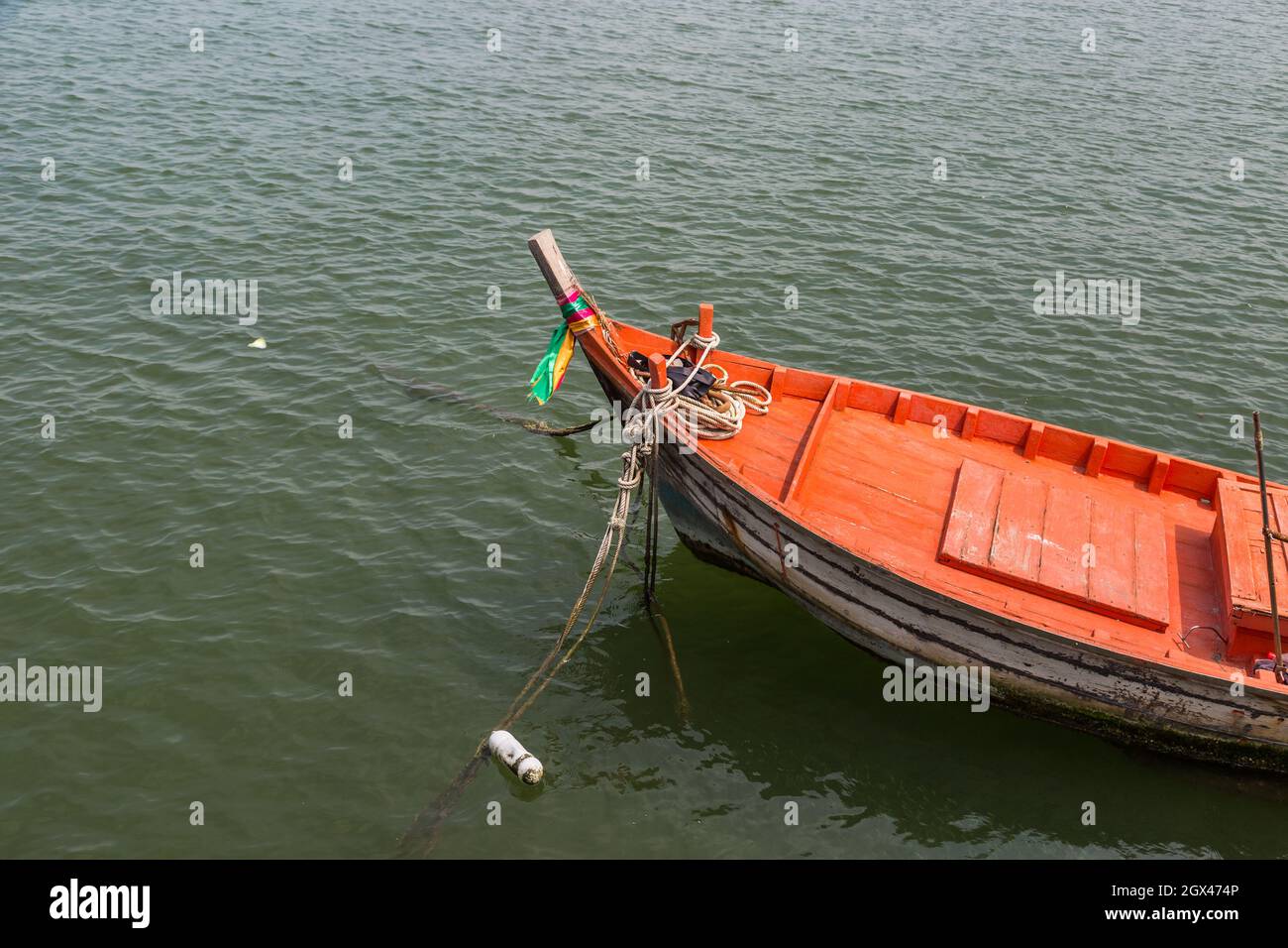 Orange wood fishing boat at Thailand Stock Photo - Alamy