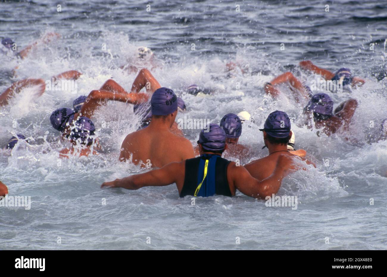 START OF A TRIATHLON, AN ENDURANCE SPORT CONSISTING OF SWIMMING ...