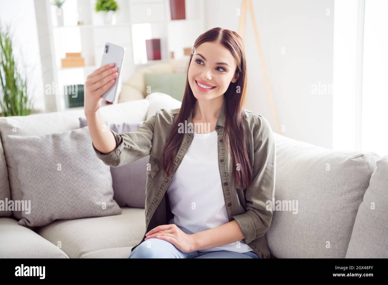 Photo Of Beautiful Cute Young Woman Dressed Khaki Shirt Tacking Selfie