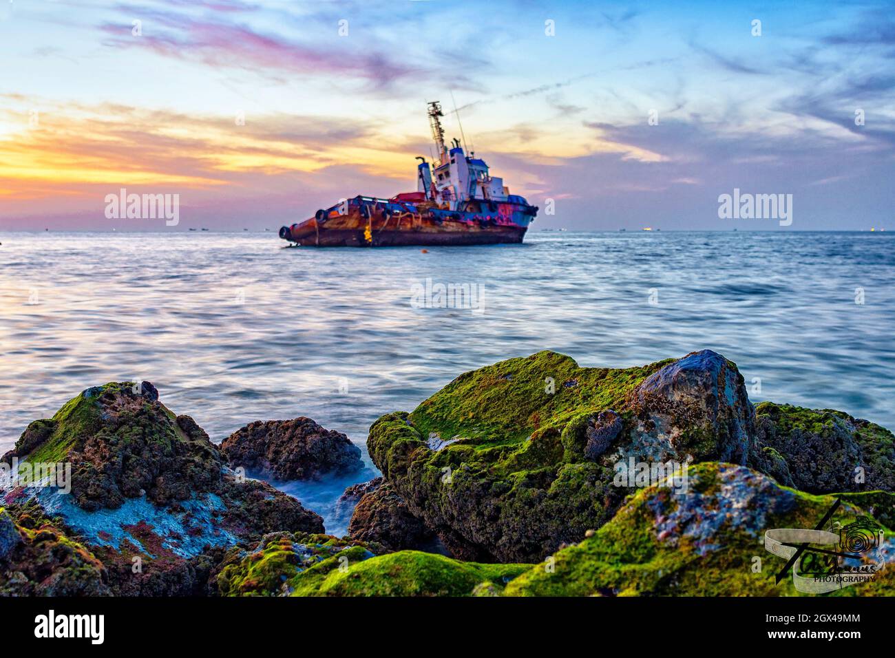 Beautiful view with a ship on a sea against sunset sky background Stock ...