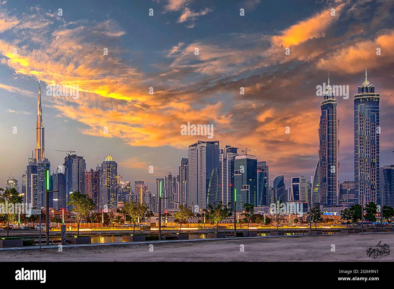 Cityscape with high buildings on the sunset sky background Stock Photo ...