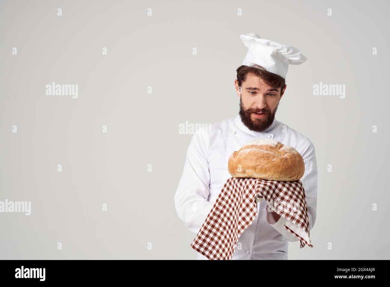 Baker Cooking bakery Professional emotions Stock Photo - Alamy