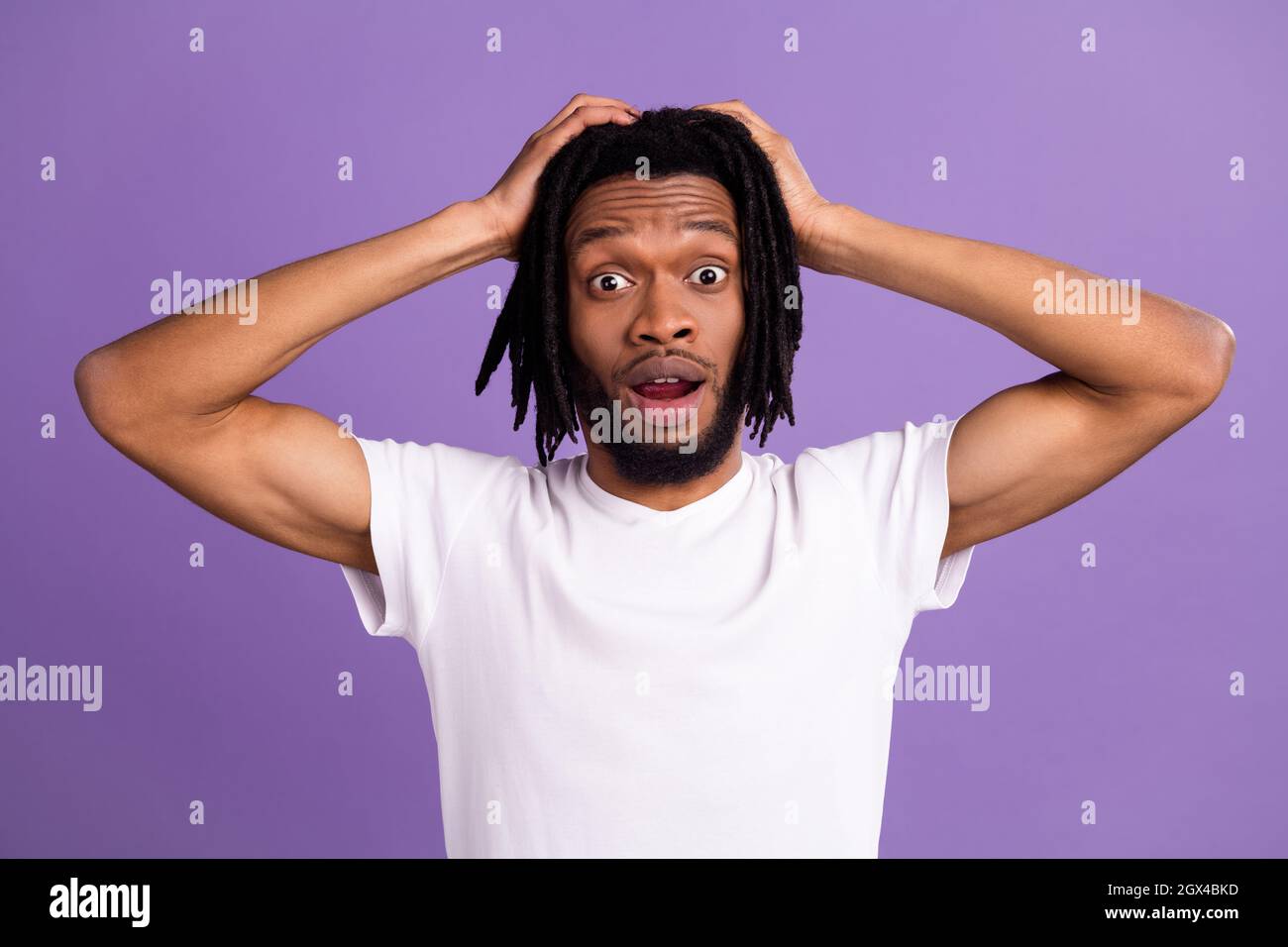 Portrait of attractive amazed stunned guy sudden news reaction isolated ...