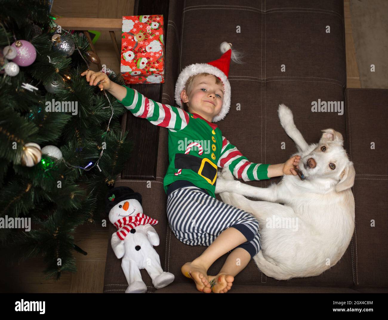 Baby feet in funny christmas hi-res stock photography and images - Alamy