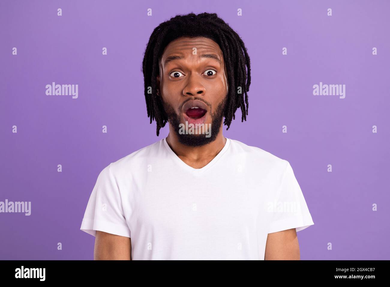 Photo of happy amazed dark skin young man shocked reaction face ...